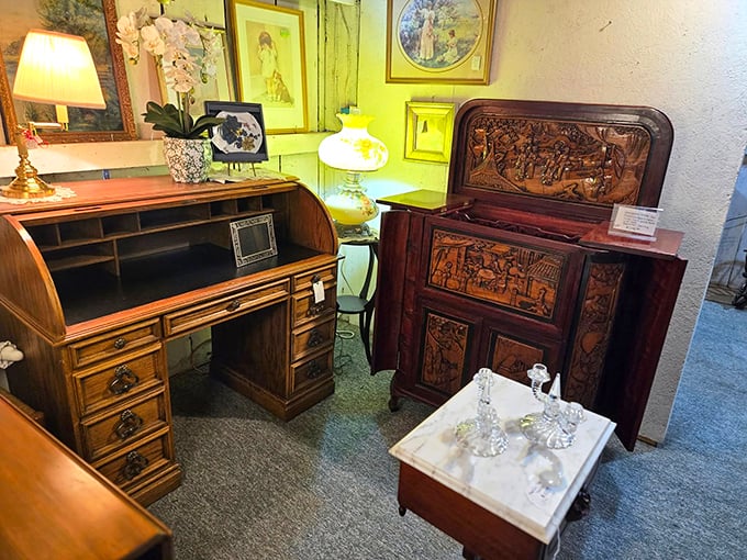 Carved details that modern furniture can only dream of—this roll-top desk and cabinet showcase craftsmanship from when time moved slower.