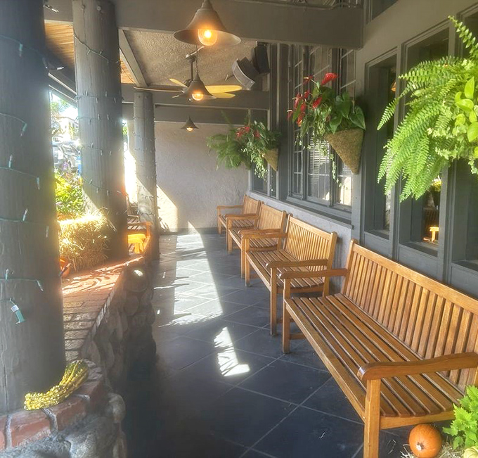 The waiting area's wooden benches bathed in California sunshine—where anticipation of what's to come is almost as delicious as the meal itself.