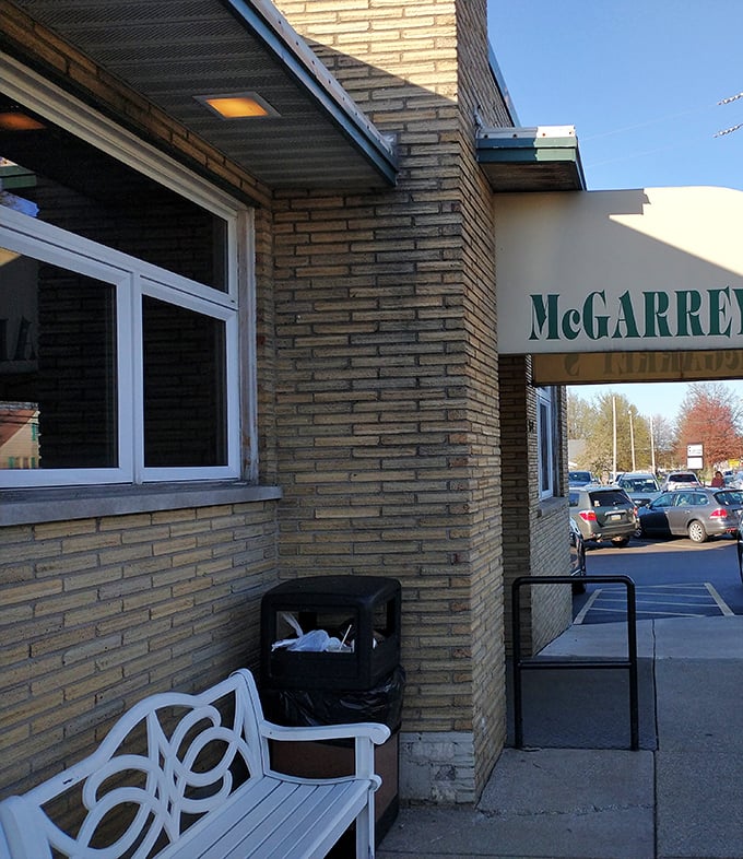 Even the waiting area outside shows thoughtful touches—a bench for those moments when great food is worth a short wait.