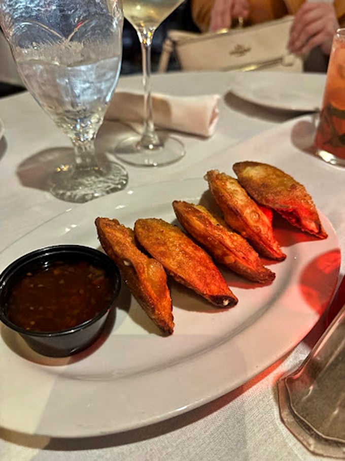 These golden wontons aren't just appetizers—they're the opening act that makes you wonder if you should skip the headliner. (But don't. You shouldn't.)