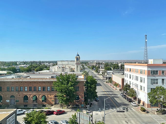 Bakersfield from above – where the Central Valley stretches like a canvas under that impossibly blue California sky. Downtown's quiet dignity reminds me of those perfect American towns in Spielberg films.