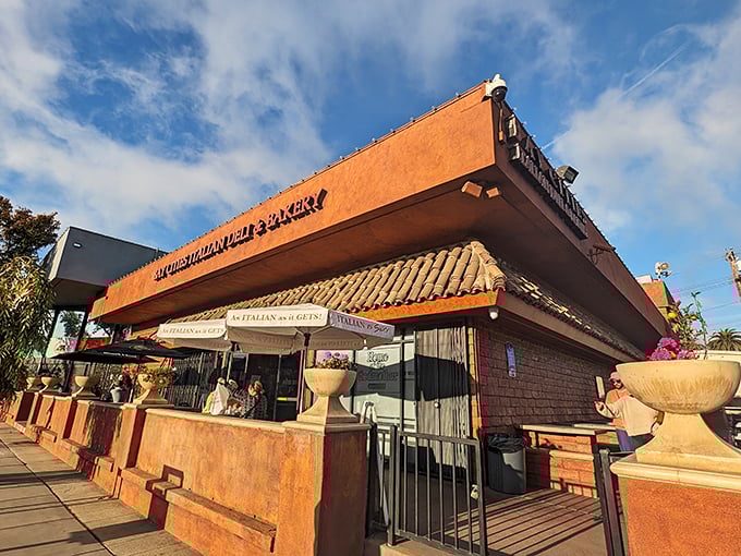 Bay Cities Italian Deli & Bakery: The brick façade and patio umbrellas hint at the Italian treasures within. Sandwich paradise awaits!