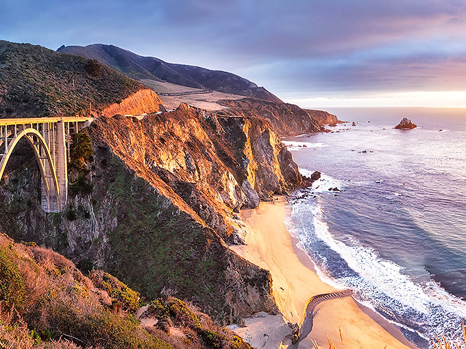 Bixby Bridge stands like a guardian of the coast, where the Santa Lucia Mountains plunge dramatically into the Pacific. Nature's masterpiece at golden hour.