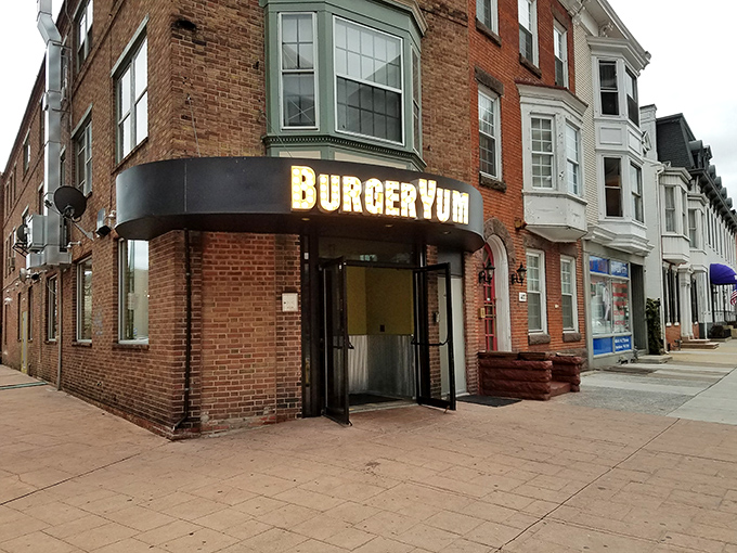 The corner brick building housing Burger Yum glows with promise – like a beacon for hungry downtown wanderers.