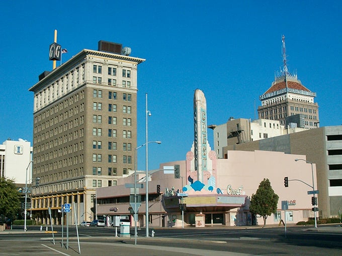 Downtown Fresno's historic skyline stands proud against the blue California sky, a testament to affordable urban living with character.