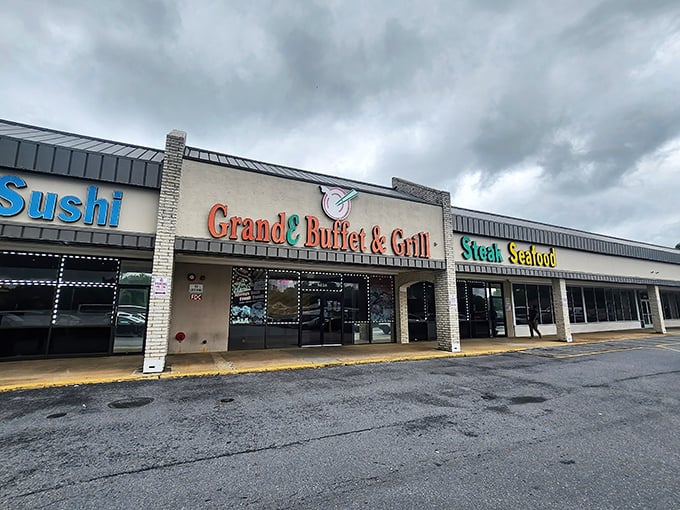 The GrandE Buffet & Grill's storefront promises a feast of epic proportions. Sushi, steak, and seafood all under one roof—it's like a United Nations of deliciousness! 