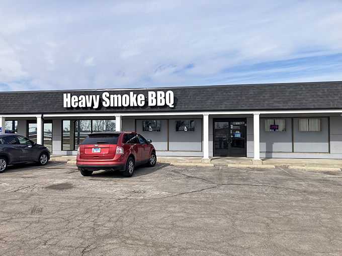The unassuming storefront of Heavy Smoke BBQ – where BBQ dreams are made and diets go to die.