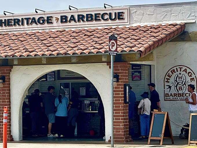Heritage Barbecue's Spanish-style entrance isn't just inviting—it's practically a portal to meat paradise. The line forms early, but trust me, this brisket pilgrimage is worth every minute of waiting.