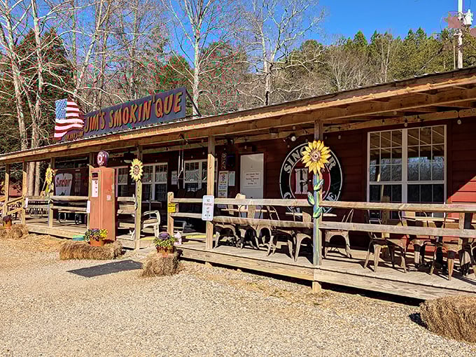 The rustic wooden facade of Jim's promises barbecue authenticity like a handwritten letter promises sincerity. American flag included!