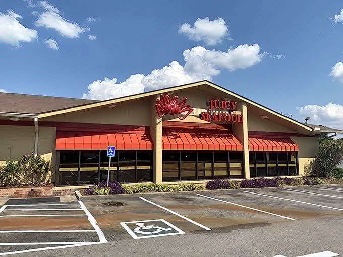 The bright red awnings of Juicy Seafood beckon like a lighthouse for hungry sailors. Simple outside, seafood paradise inside!