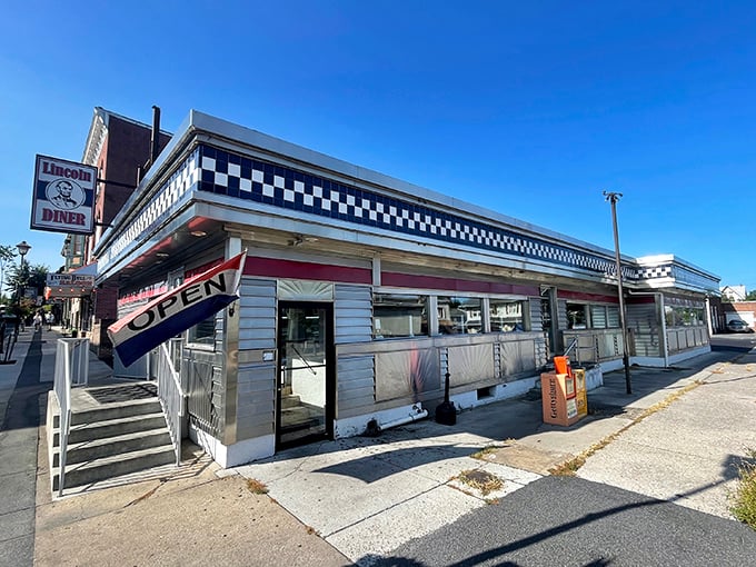 The Lincoln Diner's iconic black and white checkerboard trim isn't just decoration—it's a promise of timeless comfort food that never goes out of style.
