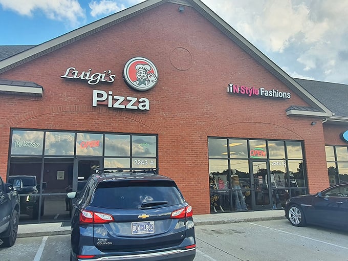 Luigi's Pizza storefront beckons with that "neighborhood favorite" vibe. The kind of brick-faced charm that promises cheese pulls worth writing home about.