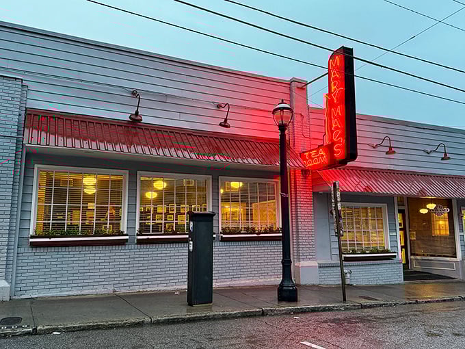 That glowing neon sign beckons like a lighthouse for hungry souls seeking Southern comfort in Atlanta's urban sea.