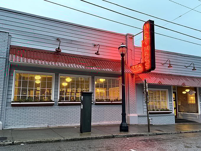 That iconic neon sign has been guiding hungry souls to Southern comfort for generations. Like a lighthouse for biscuit-seekers!