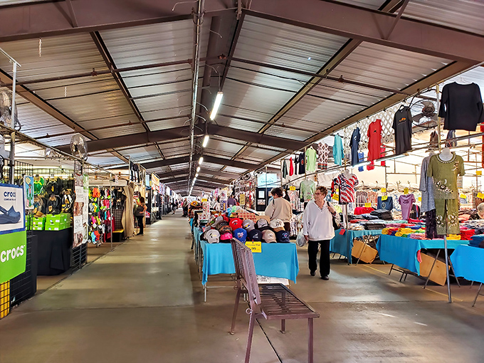 The Mesa Market Place stretches like a treasure-filled canyon, where bargain hunters roam free under the protective metal canopy.