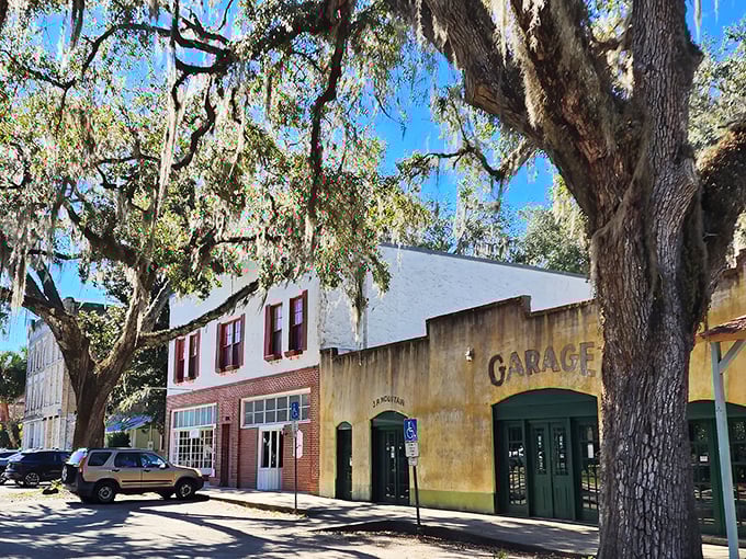 Ah, Micanopy! Where Spanish moss drapes like nature's curtains and that "Garage" sign promises treasures that would make American Pickers swoon!