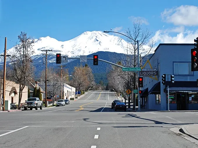 Mount Shasta's main street offers that perfect small-town vibe with a 14,000-foot snow-capped giant casually photobombing in the background.