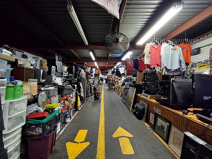 Inside Patapsco Market, where yellow arrows guide you through a treasure hunter's paradise of electronics, clothing, and unexpected finds.