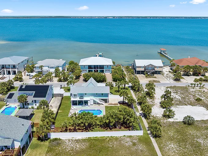 Waterfront paradise awaits! These pastel-colored beach homes with private docks offer the quintessential Florida retirement dream.