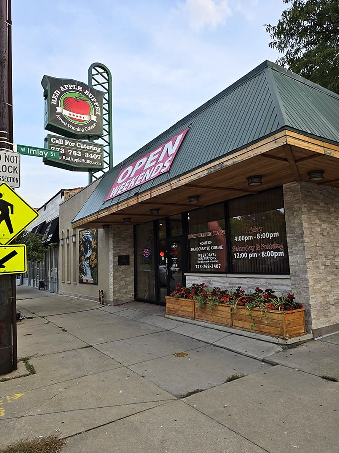 The iconic Red Apple Buffet sign beckons with promises of Polish comfort food. That green and red combo says "delicious pierogi ahead!"