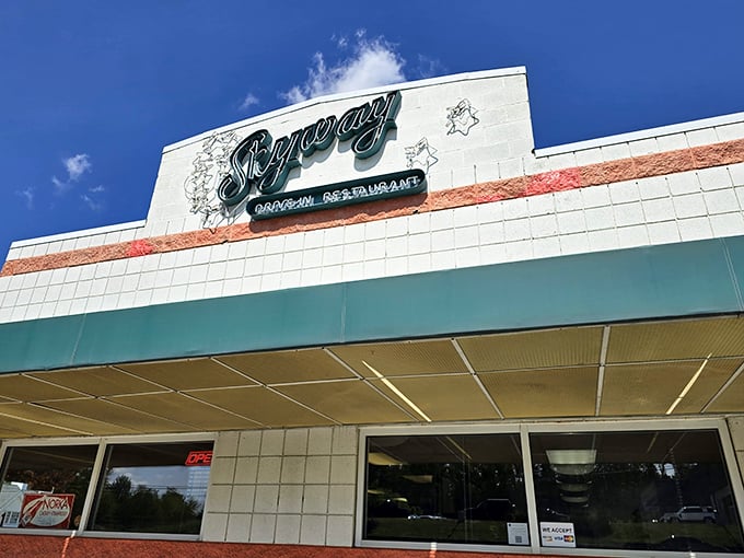 Skyway's classic white-tiled facade isn't just retro—it's a time portal to when "fast food" meant carhops and conversation.