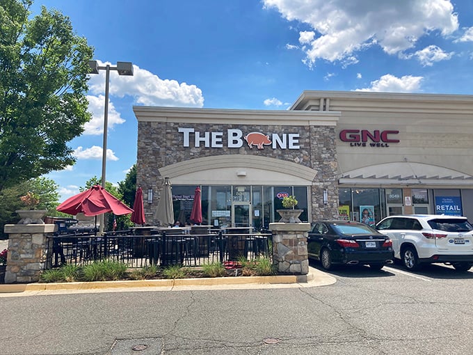 The Bone BBQ's stone facade isn't just for show—it's a temple of smoke where pork dreams come true.