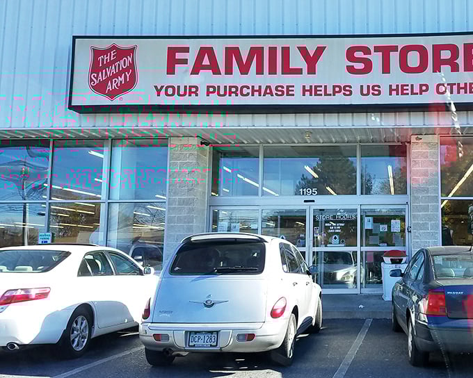 The Salvation Army's bright red sign promises more than bargains—it's a beacon of hope where shopping actually helps others.