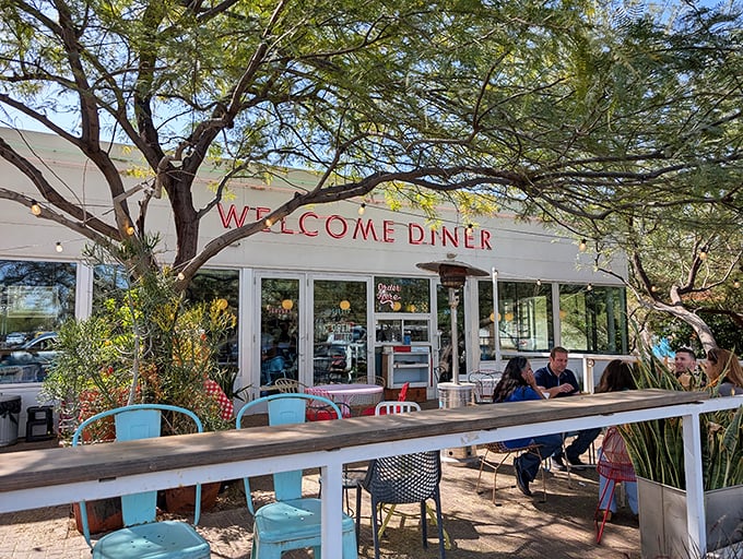 Welcome Diner's cheerful exterior invites you in like an old friend, while the colorful patio chairs promise leisurely meals under Arizona skies.