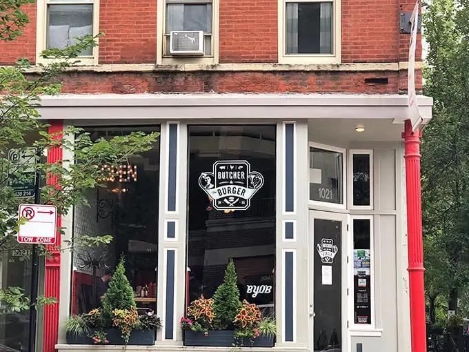 Step into burger paradise! Butcher & The Burger's clean, welcoming façade promises meaty treasures within that will haunt your dreams.