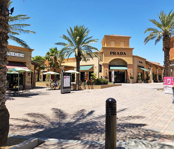 Luxury shopping without the luxury prices! Prada and Gucci storefronts bask in California sunshine at Desert Hills Premium Outlets.