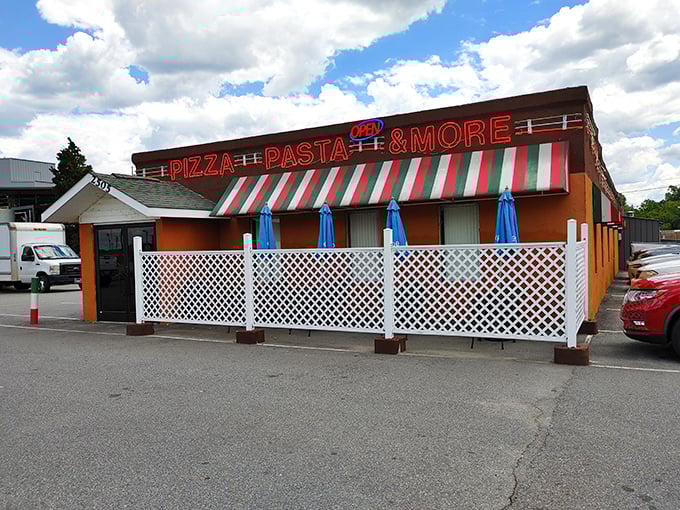 That classic red and green awning isn't just decoration—it's a time-tested signal that authentic Italian-American comfort awaits inside.