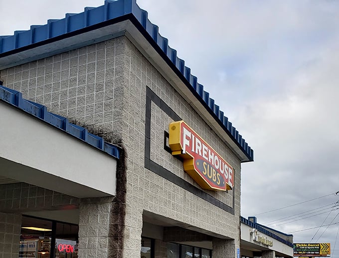 That iconic Firehouse sign promises what every lunch break needs—a heroic sandwich that fights boring meals.