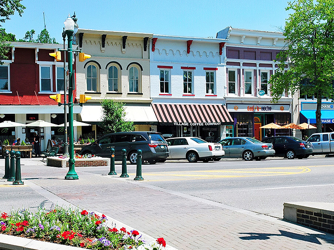 Those green lampposts aren't just street furniture—they're time machines to a more civilized era of downtown strolling.