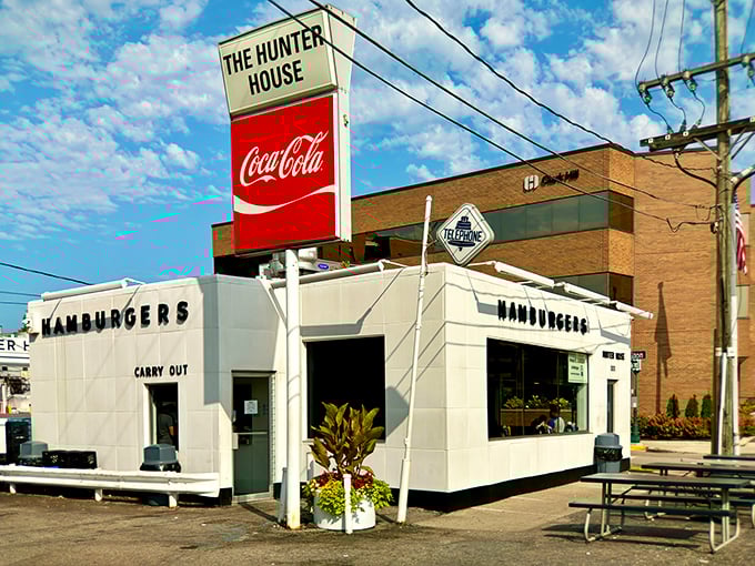 That iconic Coca-Cola sign and classic white building combo – Hunter House hasn't changed because it never needed to.
