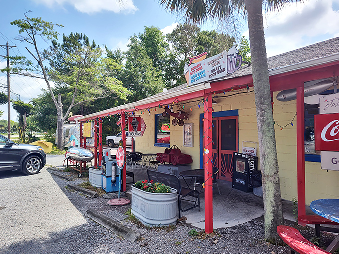 Jack's Cosmic Dogs: String lights, outdoor seating, and that silver rocket ship—this place is like a hot dog carnival for grown-ups.