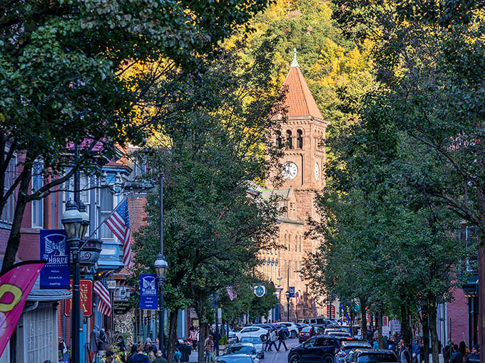 Where history meets autumn glory! Jim Thorpe's iconic clock tower stands sentinel over a street that looks like a Norman Rockwell painting come to life.