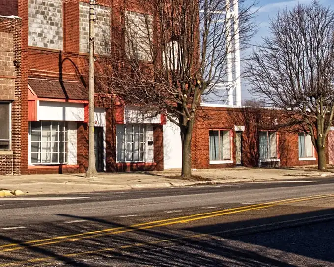 Kewanee's vintage storefronts stand like sentinels of small-town charm. The kind of place where "running errands" means catching up with half the town.