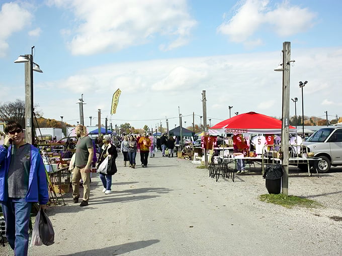 The weekend pilgrimage begins! Shoppers stroll through Rogers' gravel pathways, where one person's castoffs become another's must-haves.