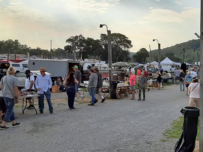 Dusk shopping at Rogers Flea Market—where one person's castoffs become another's conversation pieces for decades to come.