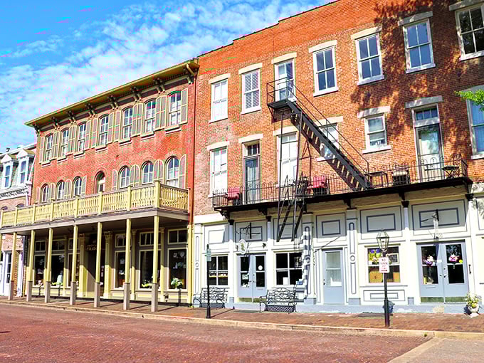 Brick-lined streets and historic storefronts in downtown St. Charles – where window shopping becomes an accidental history lesson with better architecture.