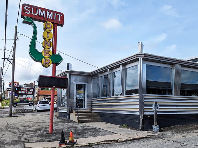 That classic neon sign beckons hungry travelers like a lighthouse for those lost in a sea of fast food chains.