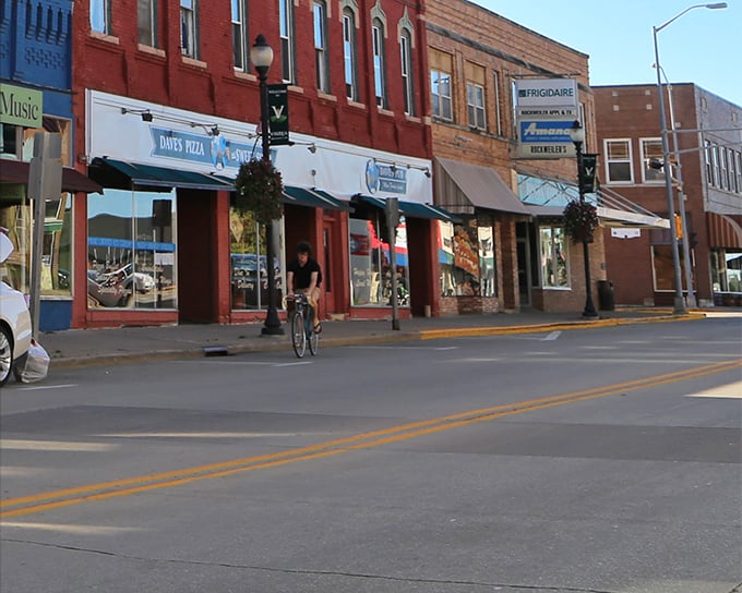 Brick buildings and blue skies – Viroqua's main street invites you to park once and explore all day.