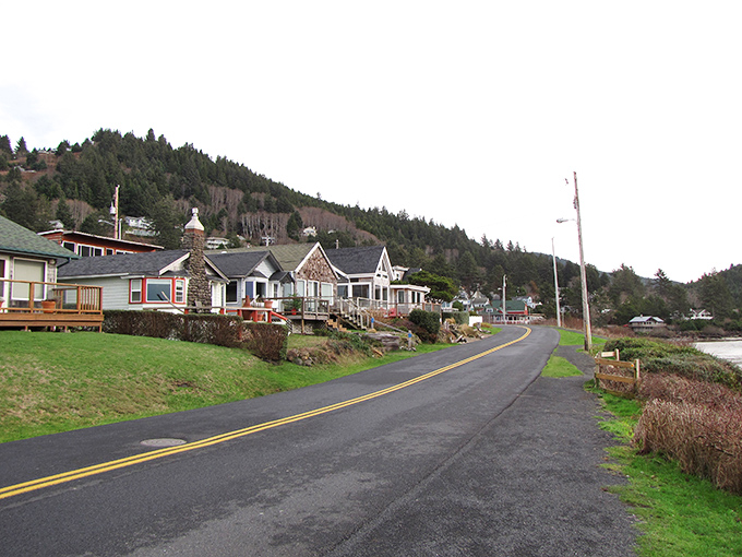 A winding coastal road leads past charming seaside cottages, where residents wake up to ocean views that millionaires would envy.