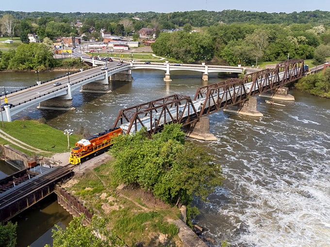 Where bridges do triple duty and your retirement dollars stretch like Sunday afternoon naps.