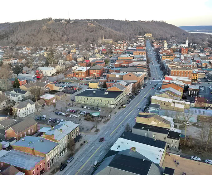 From above, Madison reveals its perfect positioning – nestled between rolling hills and the mighty Ohio River, with history radiating from its grid of streets.