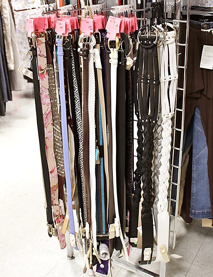 A rainbow of belts awaits new waistlines. Each one tells a different story—some flashier than others.