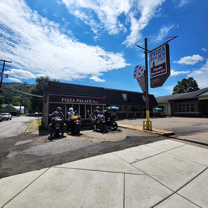 Pizza Palace Plus isn't just a meal stop—it's where motorcyclists and locals gather for hand-tossed pies that would make even a New Yorker nod in reluctant approval.