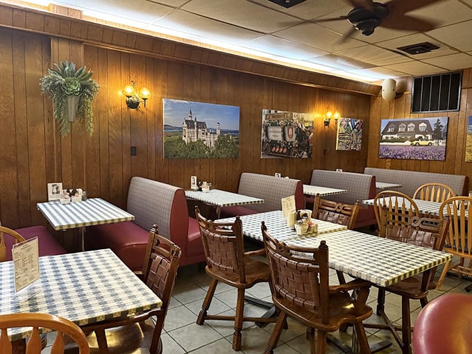 Wood-paneled walls, checkered tablecloths, and no-nonsense chairs – this dining room hasn't chased trends since bell-bottoms were in, and that's precisely its charm.