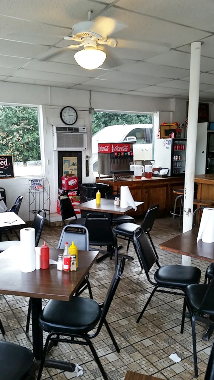 No-frills dining at its finest—where paper towels outnumber fancy napkins and conversations flow as freely as the sweet tea.