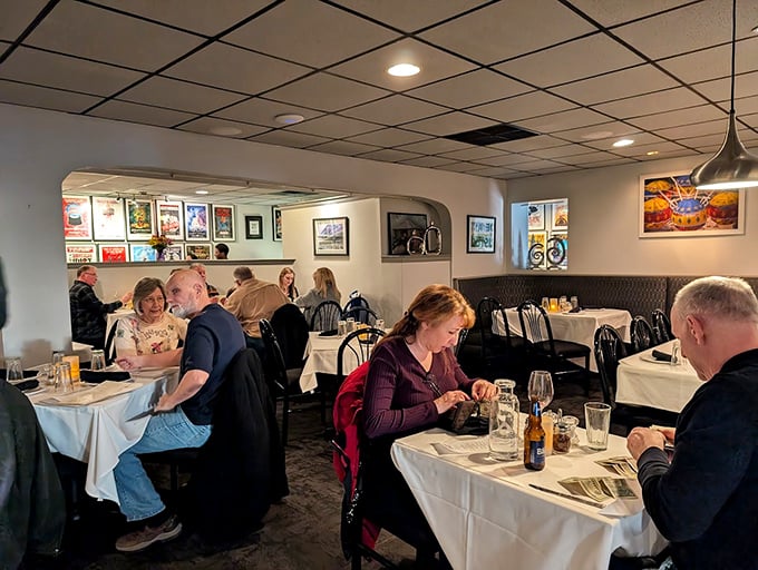 White tablecloths and warm lighting create that perfect "special occasion that happens every Tuesday" atmosphere that keeps regulars coming back.